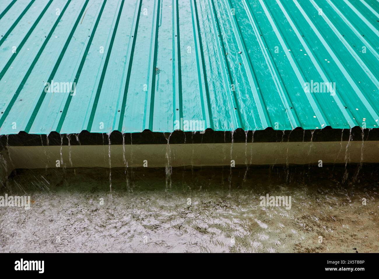 Rain drops falling on house hi-res stock photography and images - Alamy