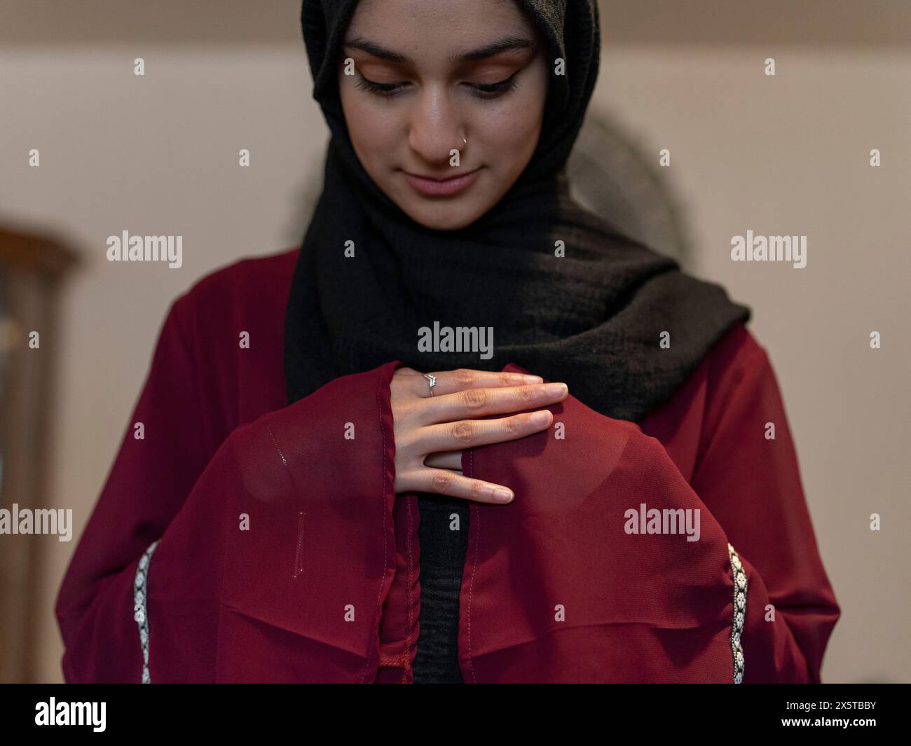 Woman praying during Ramadan celebration at home Stock Photo - Alamy