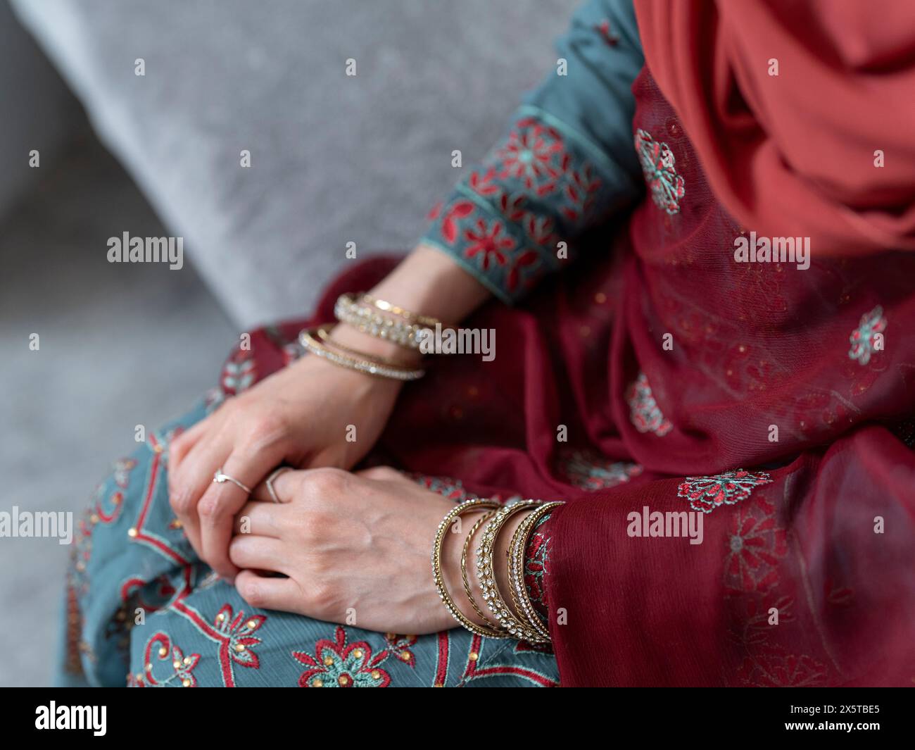 Woman wearing bracelets hi-res stock photography and images - Alamy