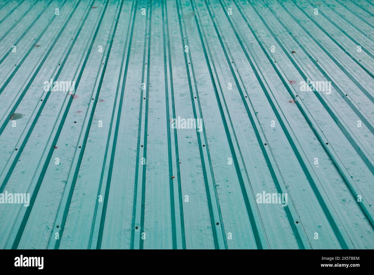 Raindrops on metal roof hi-res stock photography and images - Alamy