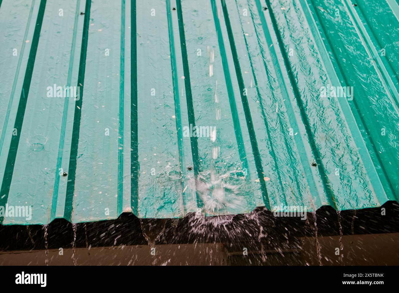 Raindrops on corrugated metal roof Stock Photo - Alamy