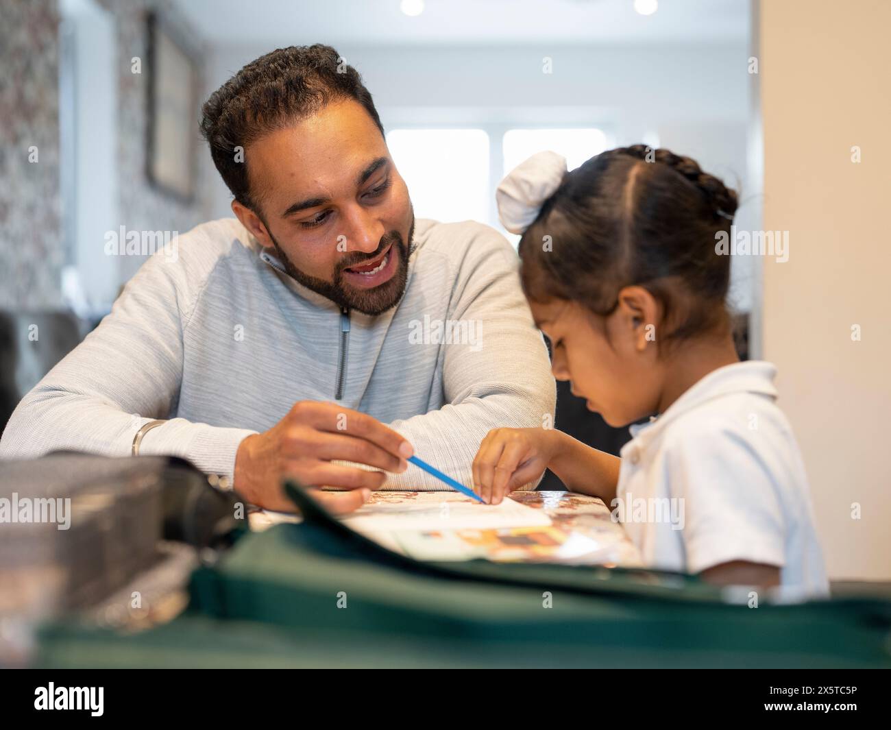 Father son homework hi-res stock photography and images - Alamy