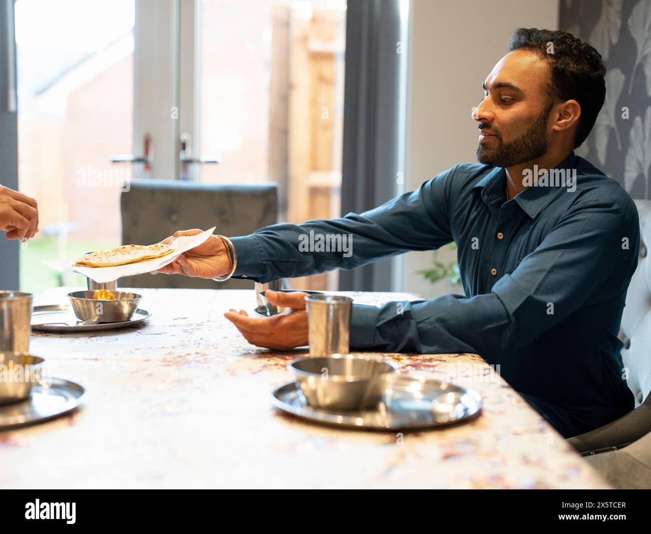 Indian sharing bread hi-res stock photography and images - Alamy