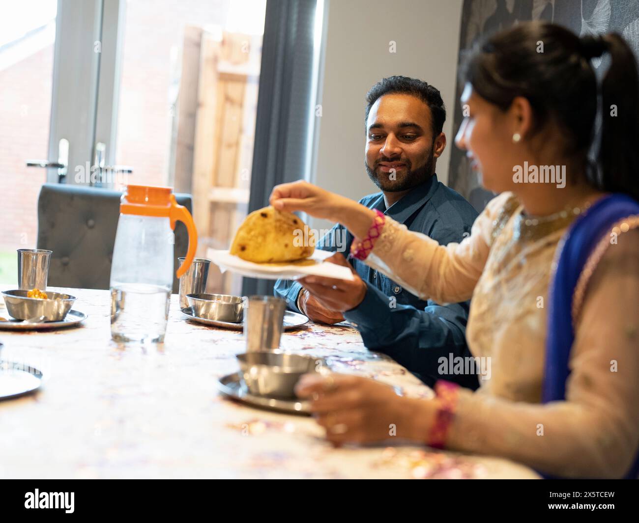 Indian couple eating hi-res stock photography and images - Alamy