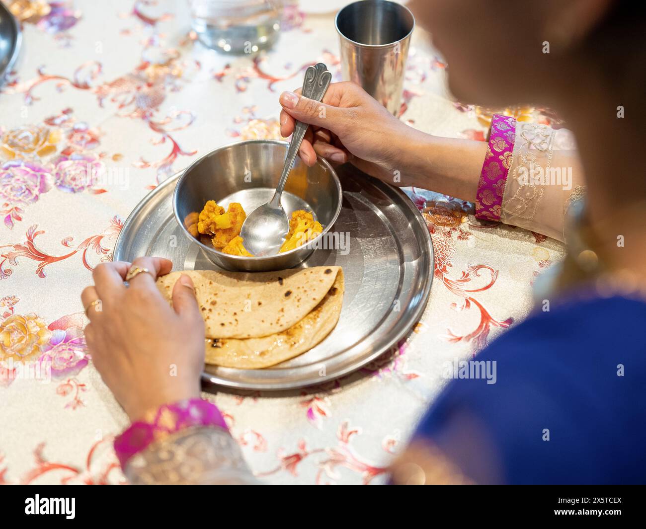 Indian person eating hi-res stock photography and images - Alamy