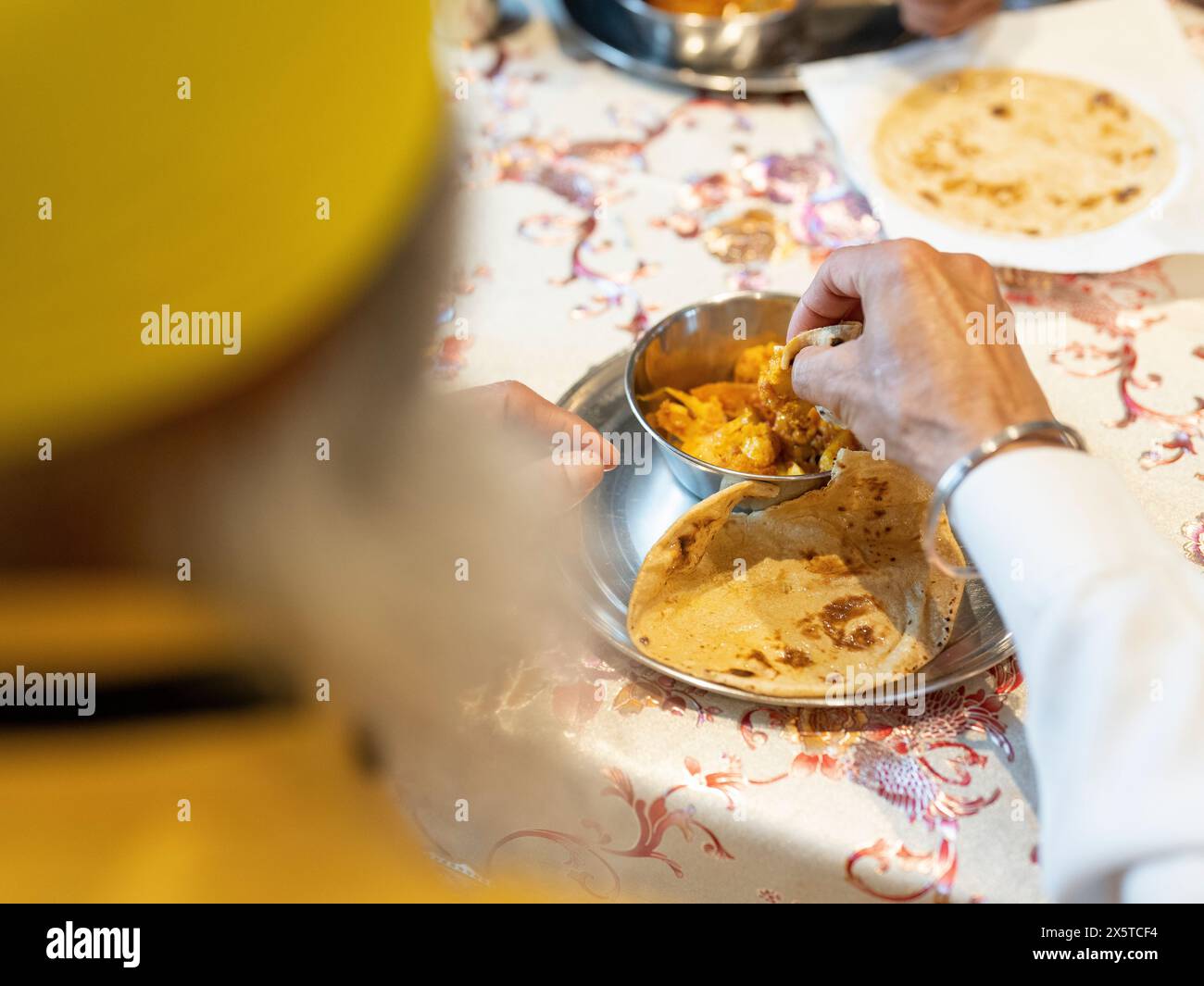 Indian person eating hi-res stock photography and images - Alamy