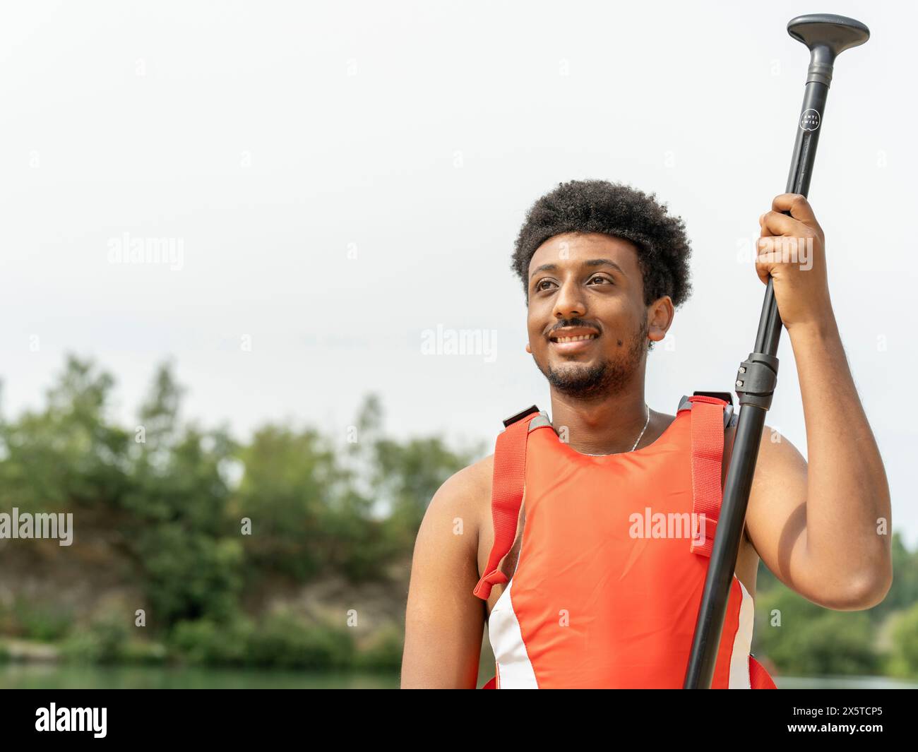 Man wearing life jacket hi-res stock photography and images - Alamy