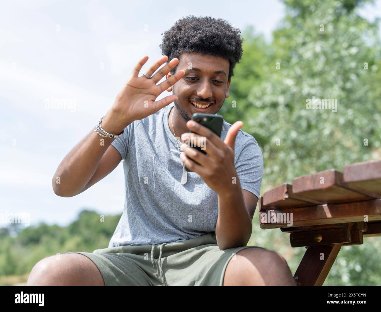 Handsome man on video call hi-res stock photography and images - Alamy
