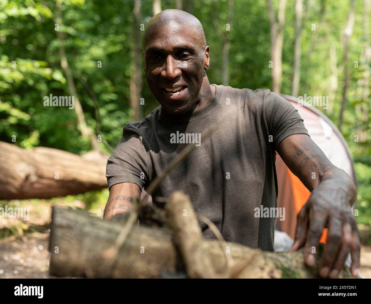 Man making firewood hi-res stock photography and images - Alamy