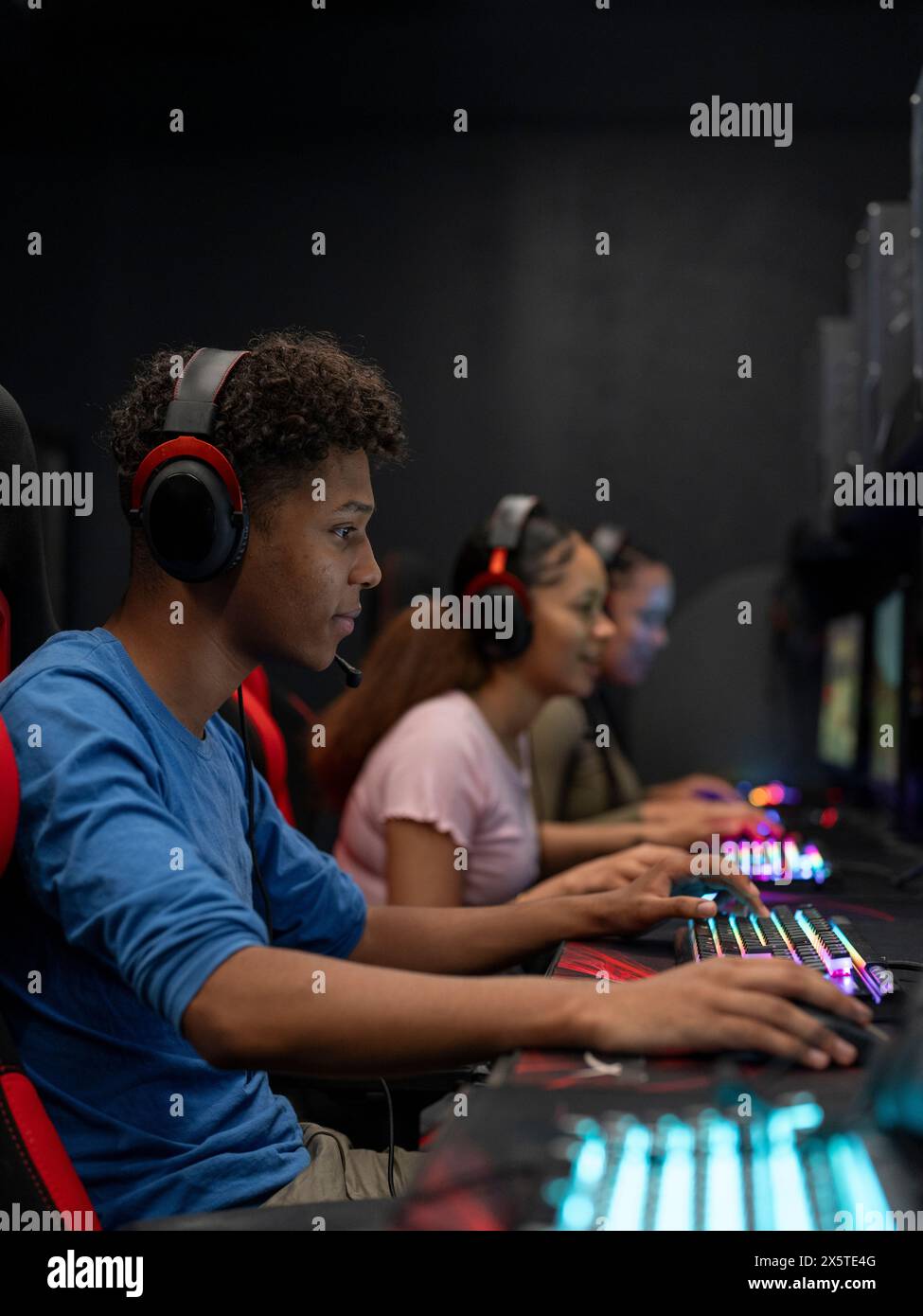 Online gaming three friends sitting hi-res stock photography and images ...