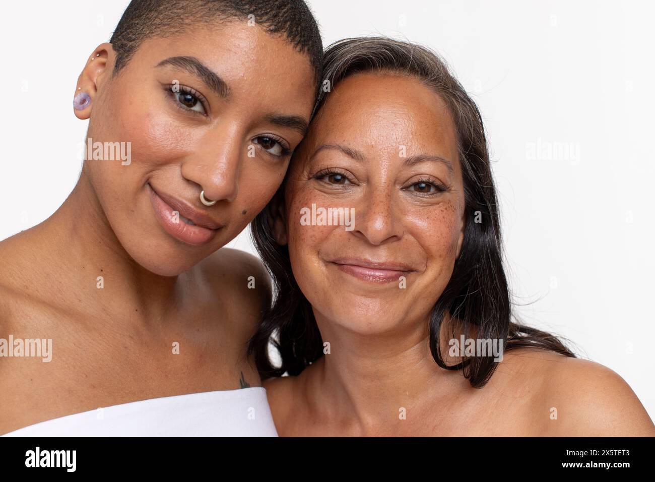 Studio portrait of smiling women Stock Photo - Alamy