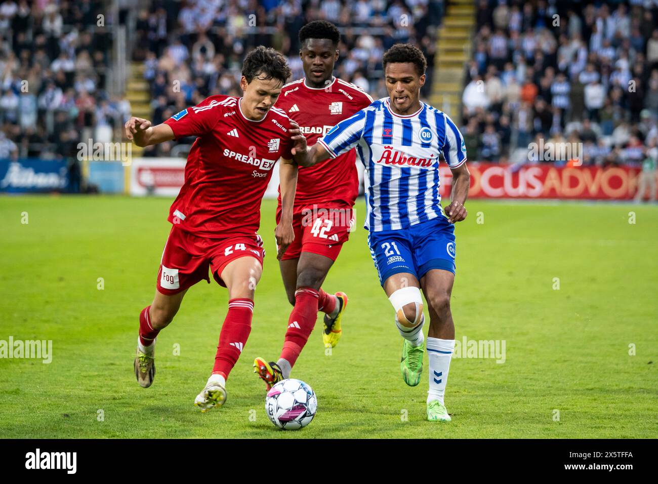 Odense, Denmark. 10th May, 2024. Charly Nouck (21) of OB and Tobias Storm (24) of Lyngby seen ...