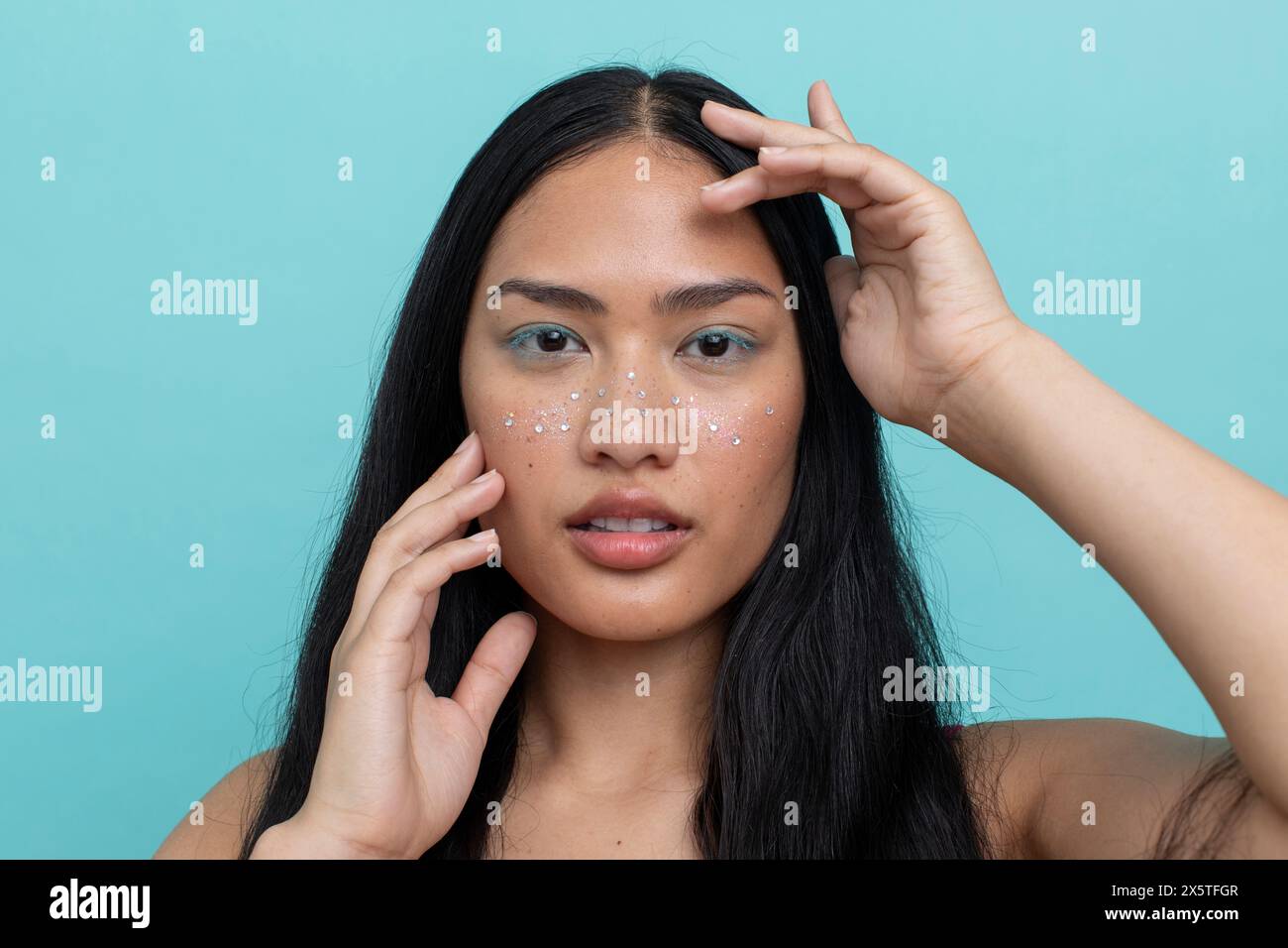 Young woman long shiny hi-res stock photography and images - Alamy