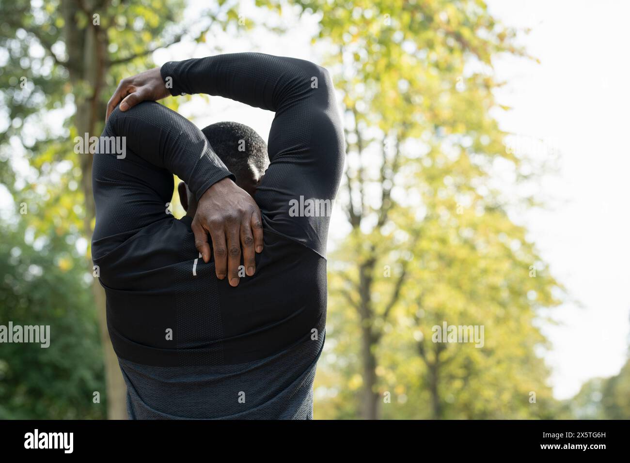 Rear view african arm hi-res stock photography and images - Alamy