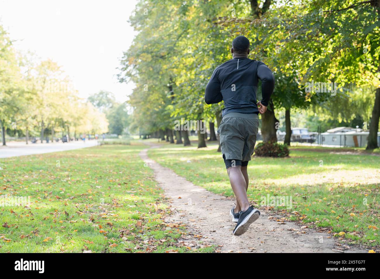 Black man jogging hi-res stock photography and images - Alamy