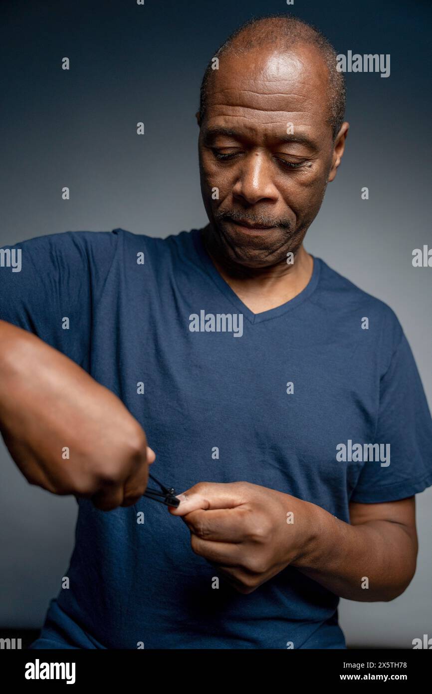 Cutting nails on man hi-res stock photography and images - Alamy