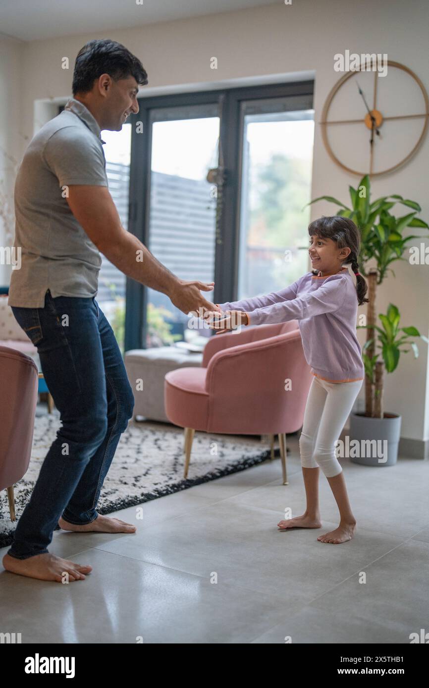 Family living in one room uk hi-res stock photography and images - Alamy