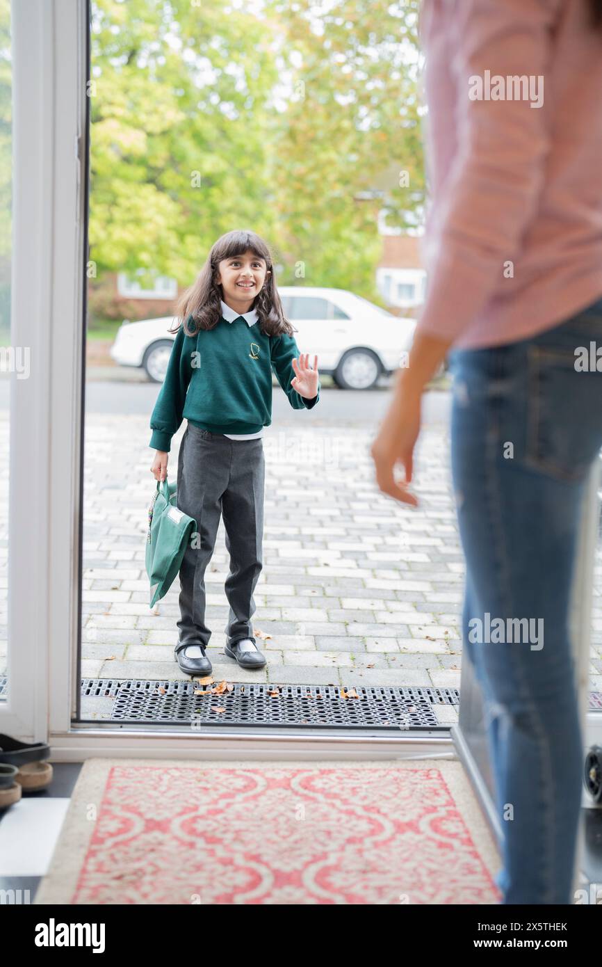 Little girl leaving home to school Stock Photo - Alamy
