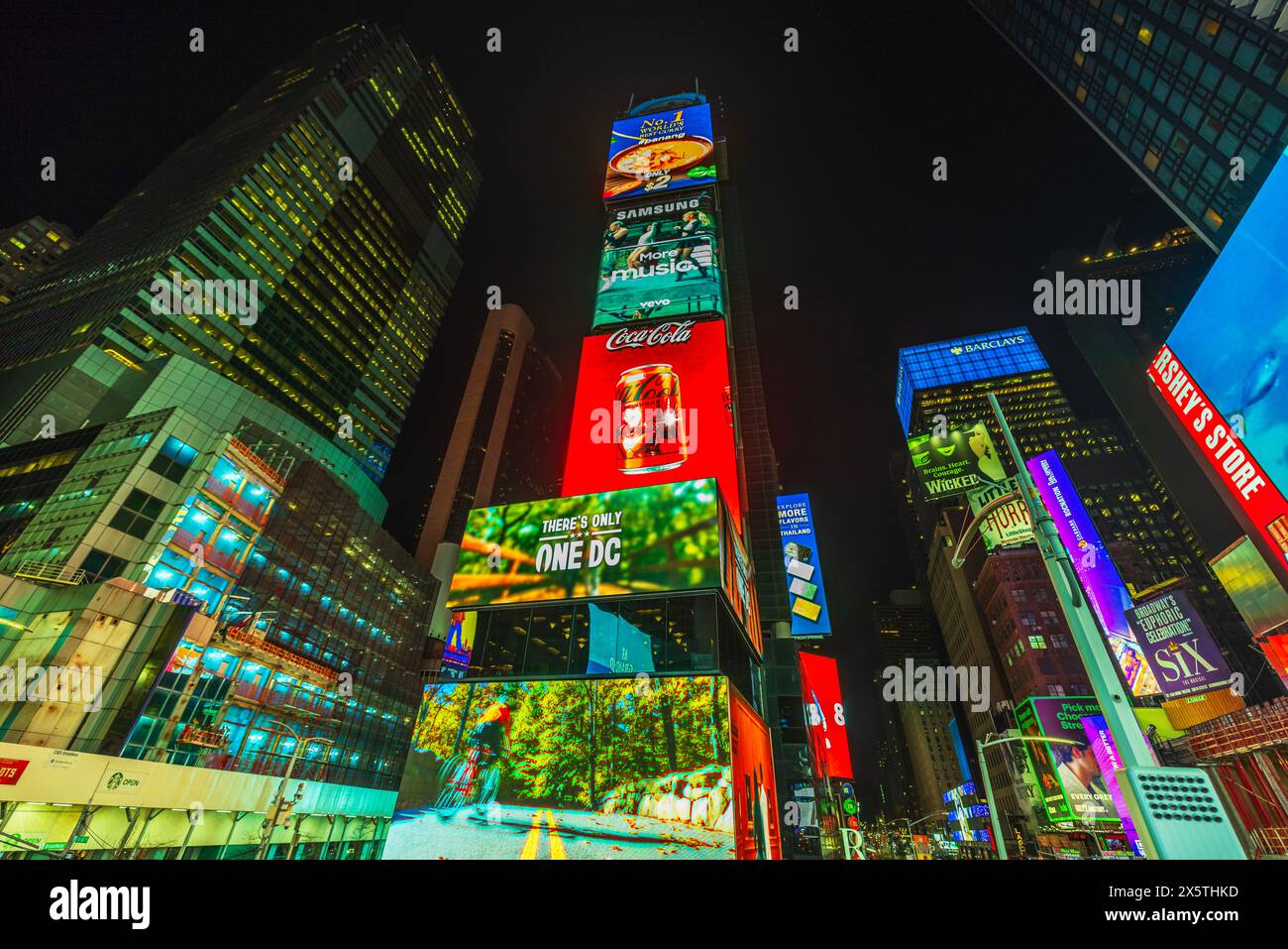 View of Nighttime Broadway with illuminated LED advertising panels on ...
