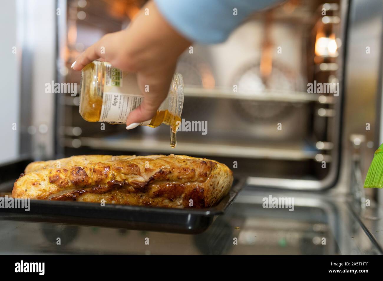 Close up woman hand pouring hi-res stock photography and images - Alamy