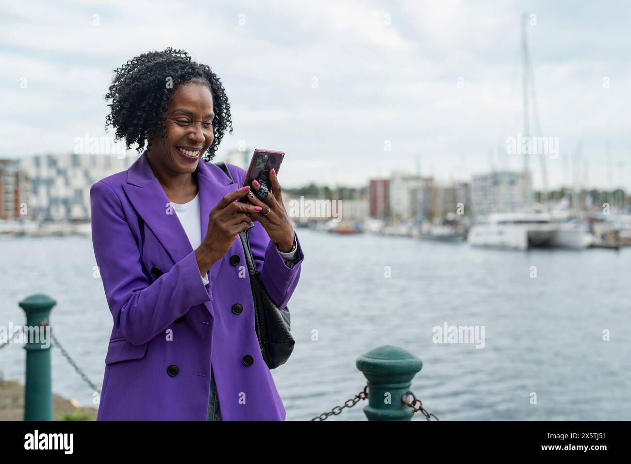 Woman standing in front river hi-res stock photography and images - Alamy