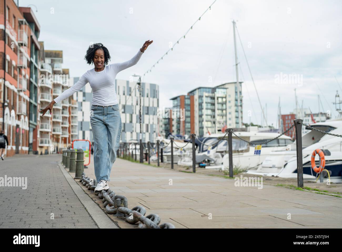 Woman chain hi-res stock photography and images - Alamy