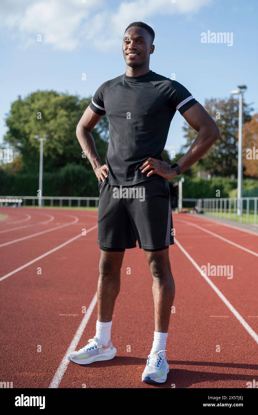 Portrait of athlete at stadium Stock Photo - Alamy