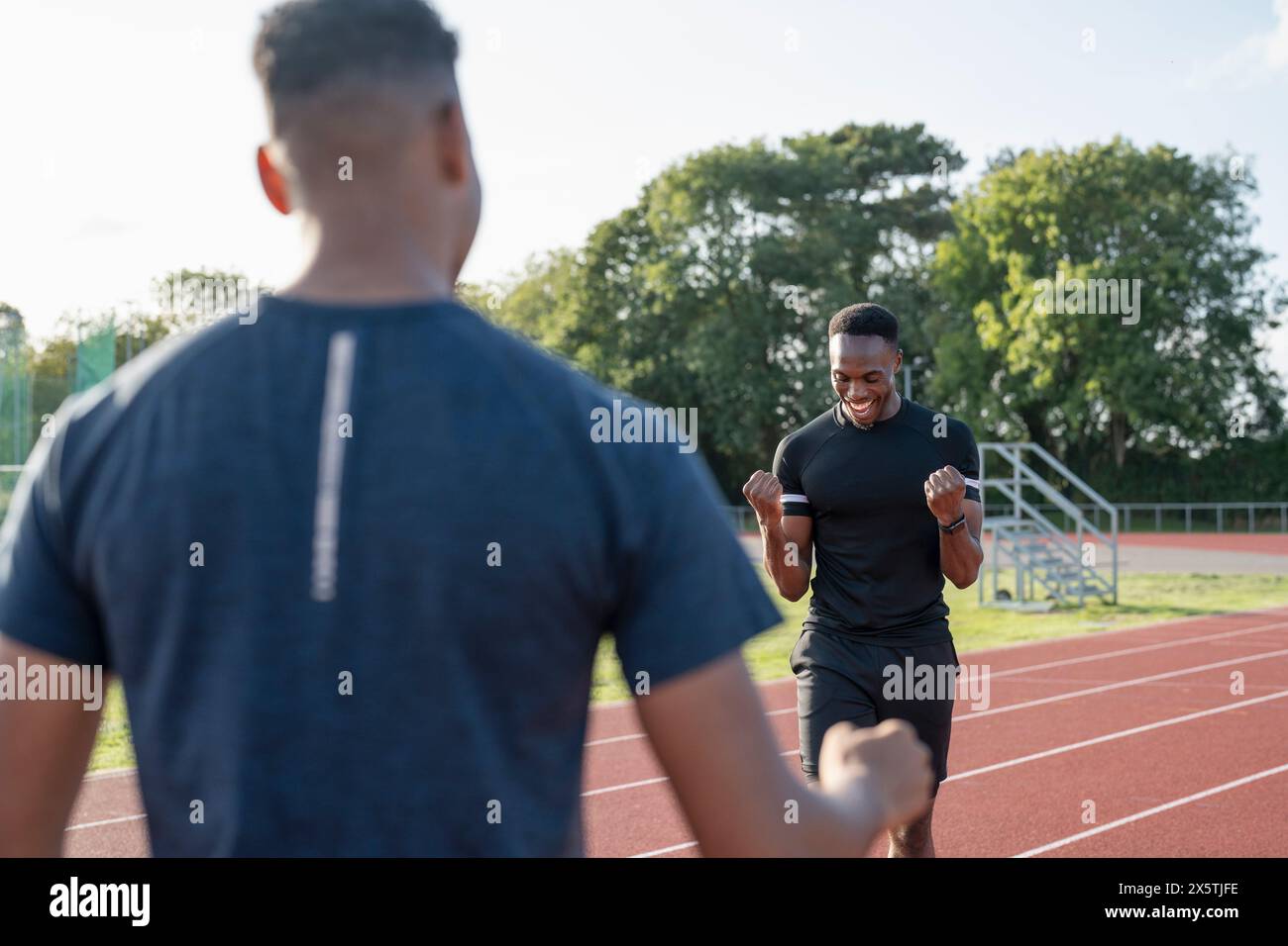 Portrait of two athletes enjoying training Stock Photo - Alamy