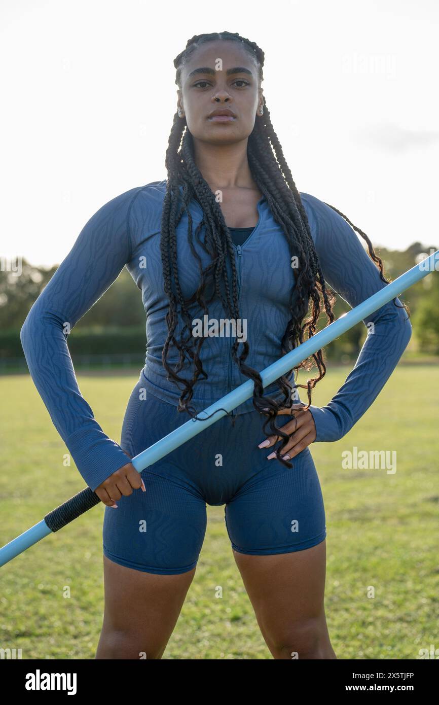 Portrait of confident female athlete holding javelin Stock Photo - Alamy Portrait of confident female athlete holding javelin Stock Photo - Alamy