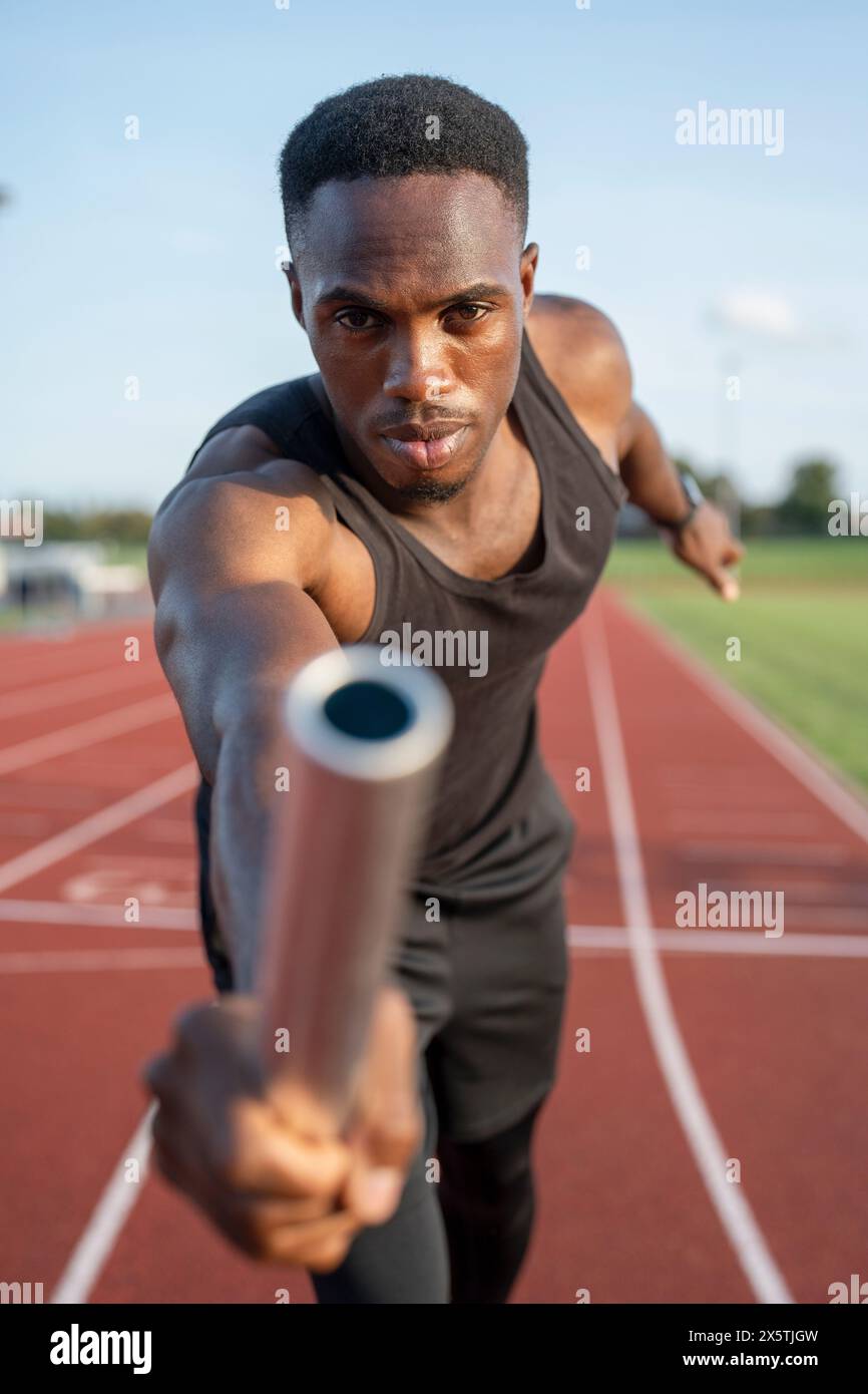 Relay baton hi-res stock photography and images - Alamy