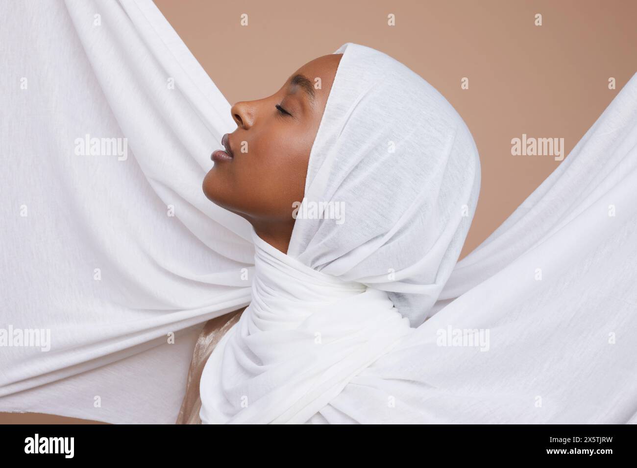 Woman in white studio hi-res stock photography and images - Alamy