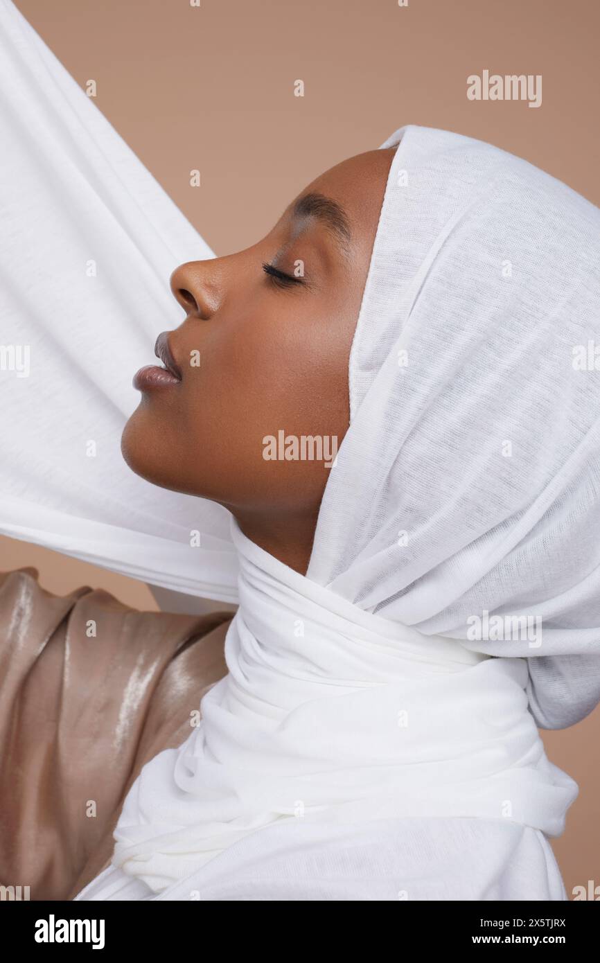 Woman in white studio hi-res stock photography and images - Alamy