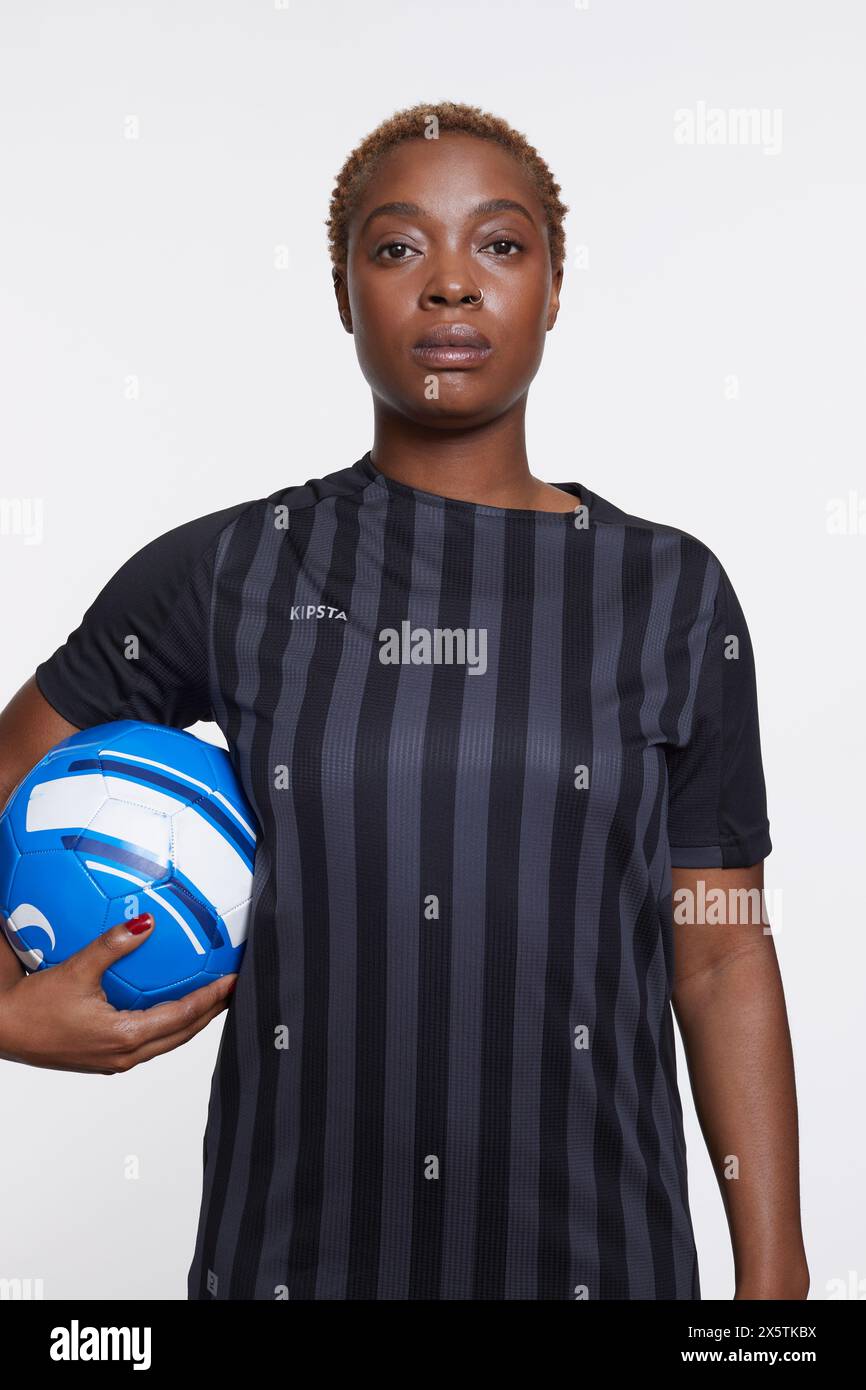 Portrait female football player standing hi-res stock photography and ...