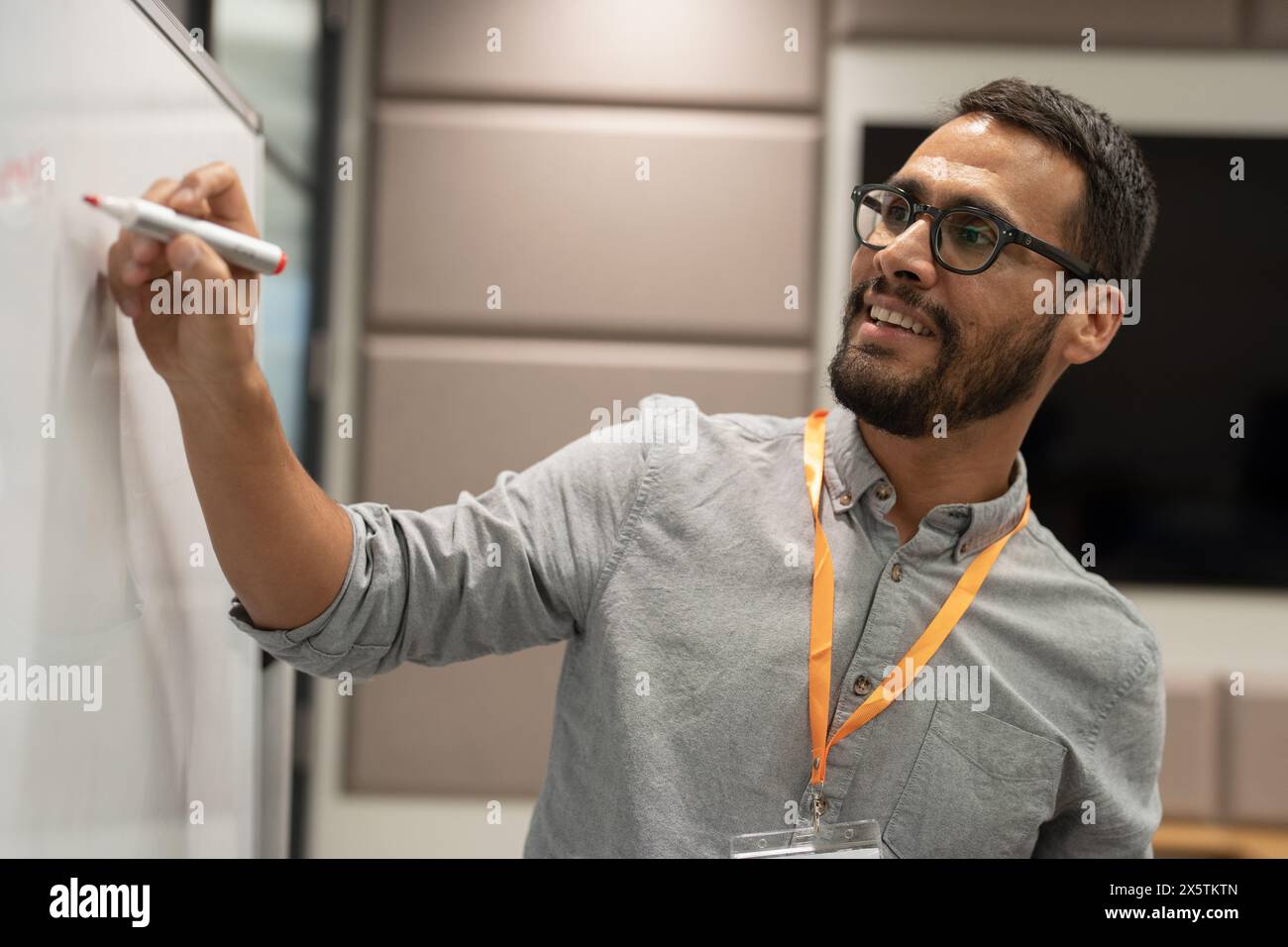 Leader making presentation in office Stock Photo - Alamy