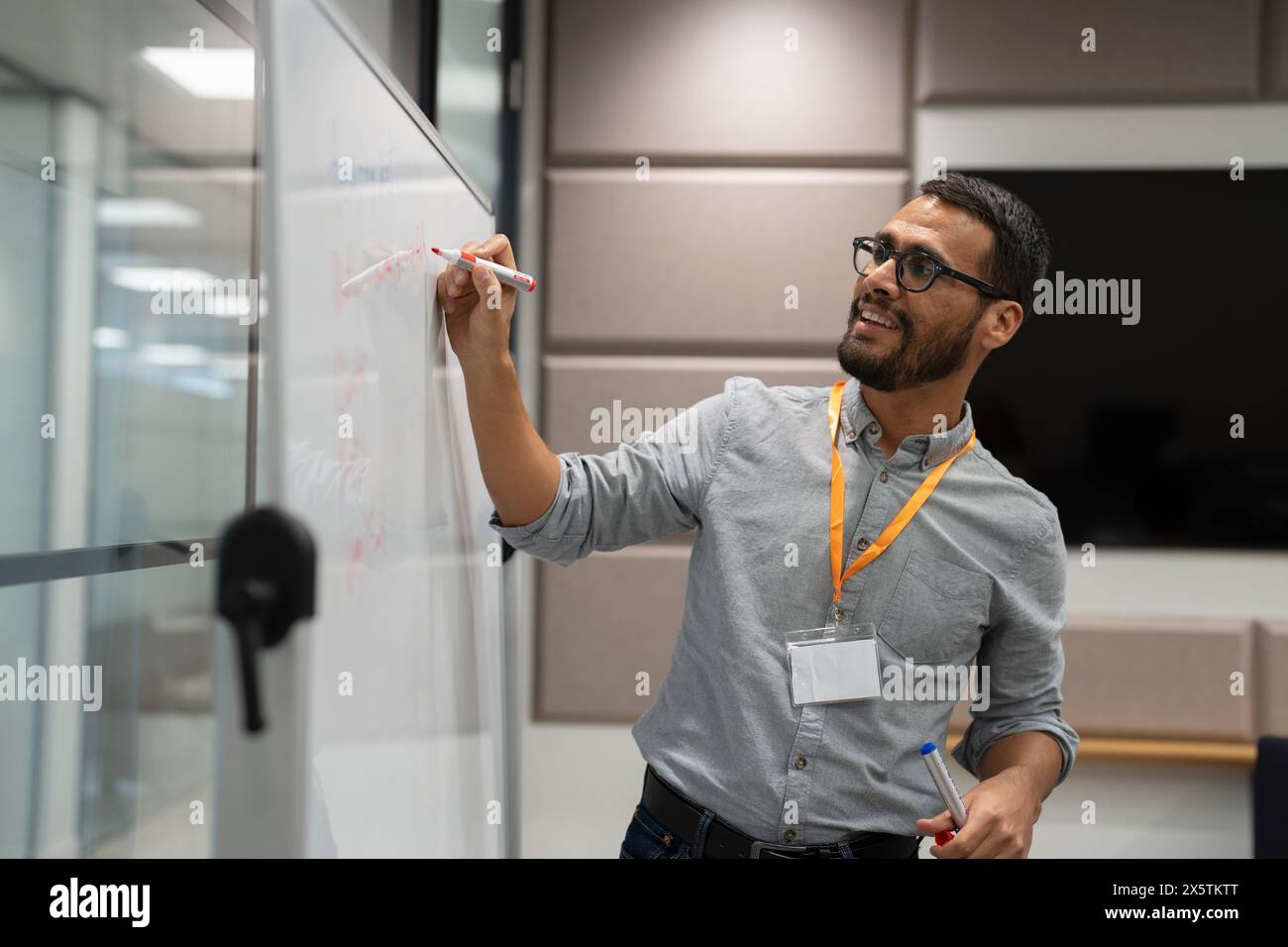 Leader making presentation in office Stock Photo - Alamy