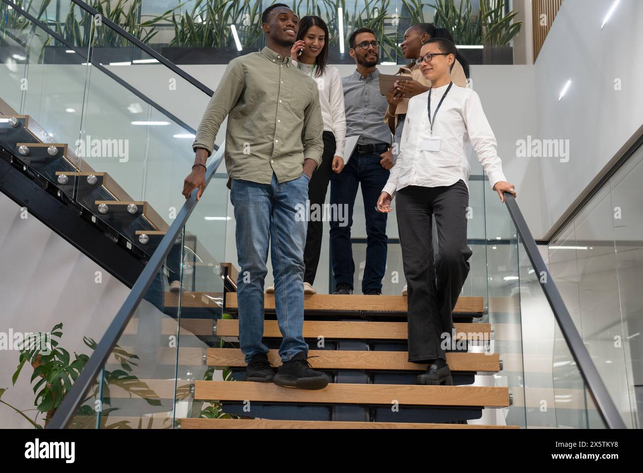 Modern walking office women hi-res stock photography and images - Alamy