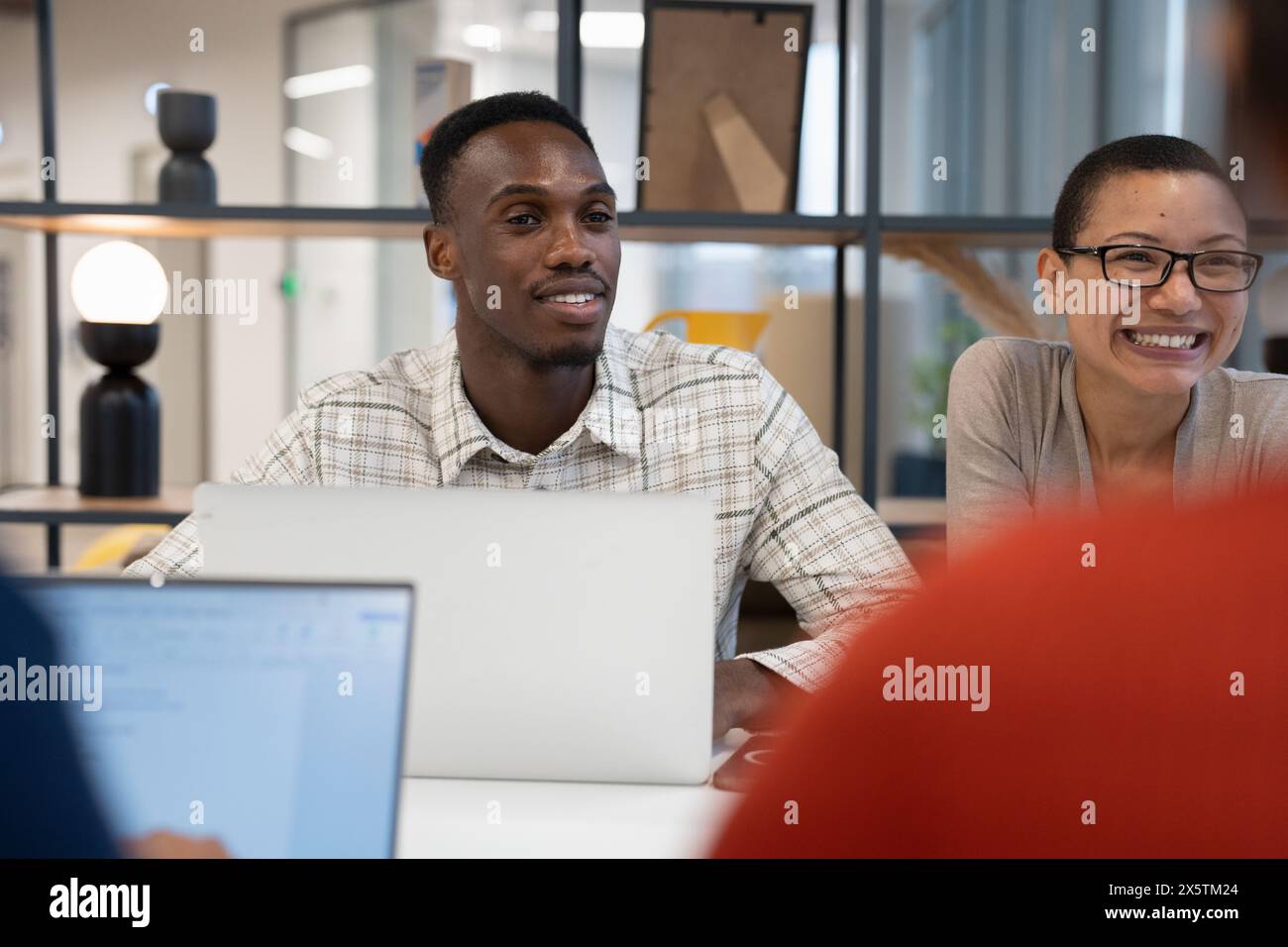 Office workers working together Stock Photo - Alamy