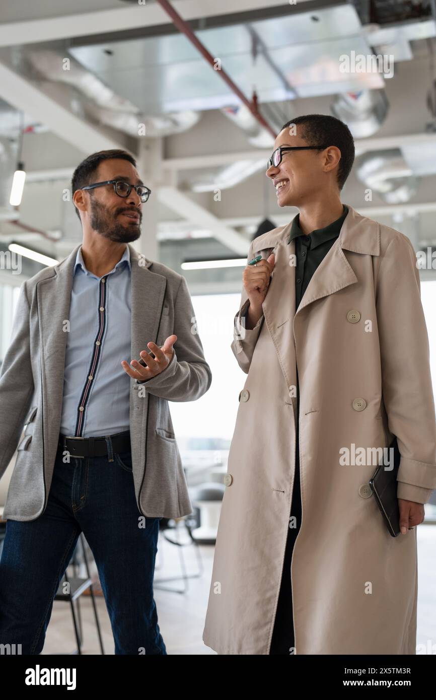 Two office workers walking businessman hi-res stock photography and ...