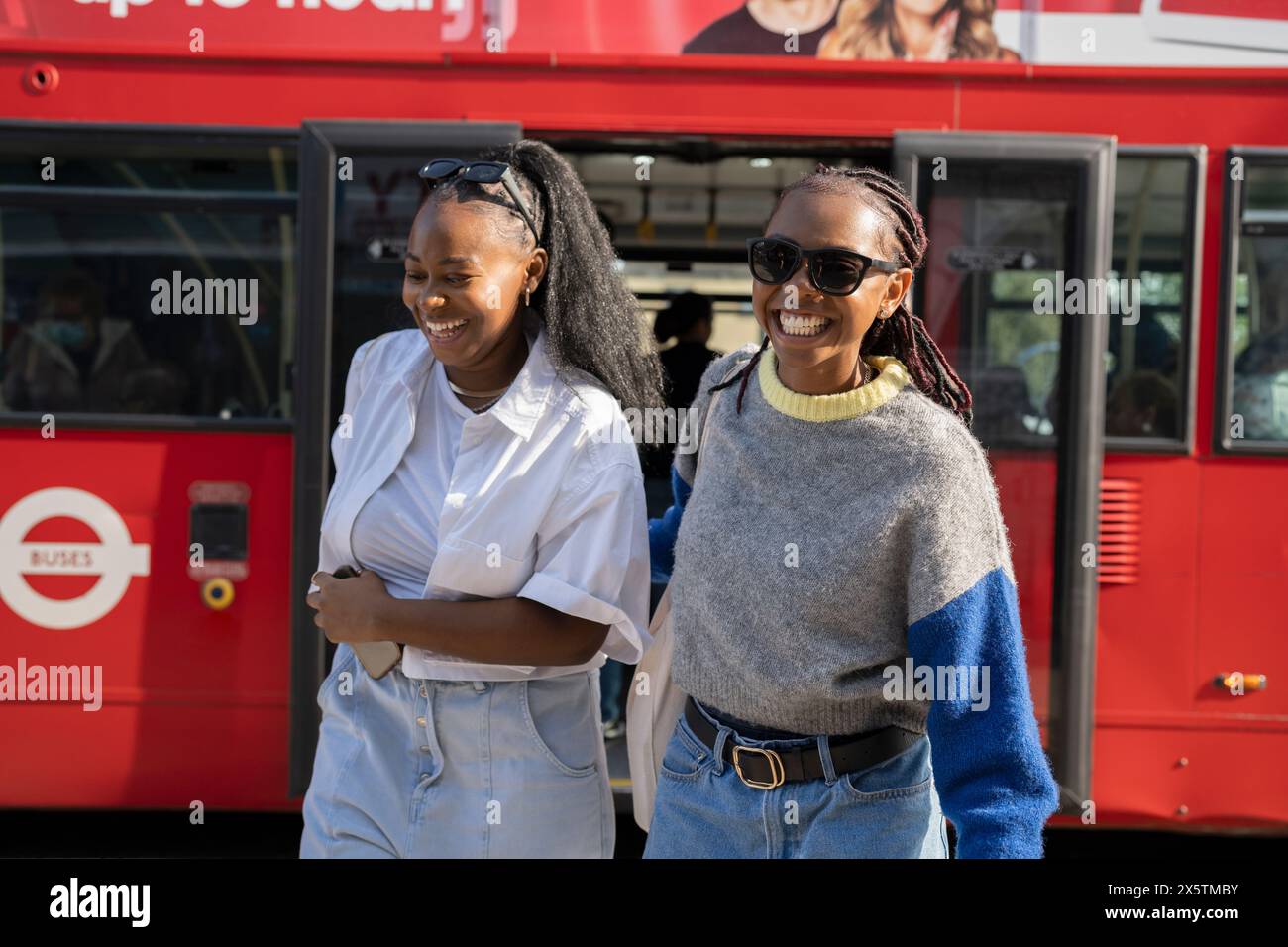 Getting off bus hi-res stock photography and images - Alamy