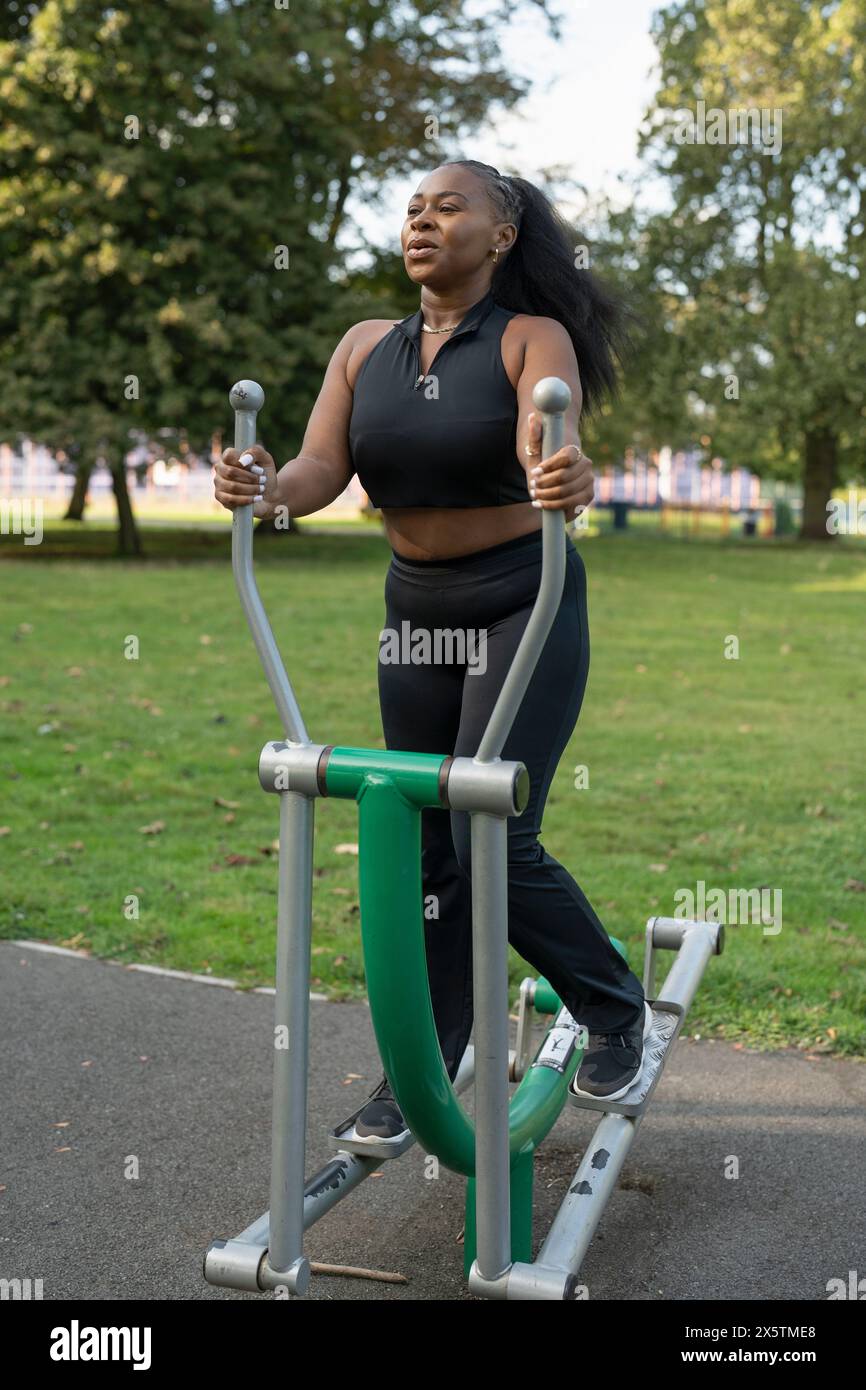 Woman exercising outdoor gym hi-res stock photography and images - Alamy