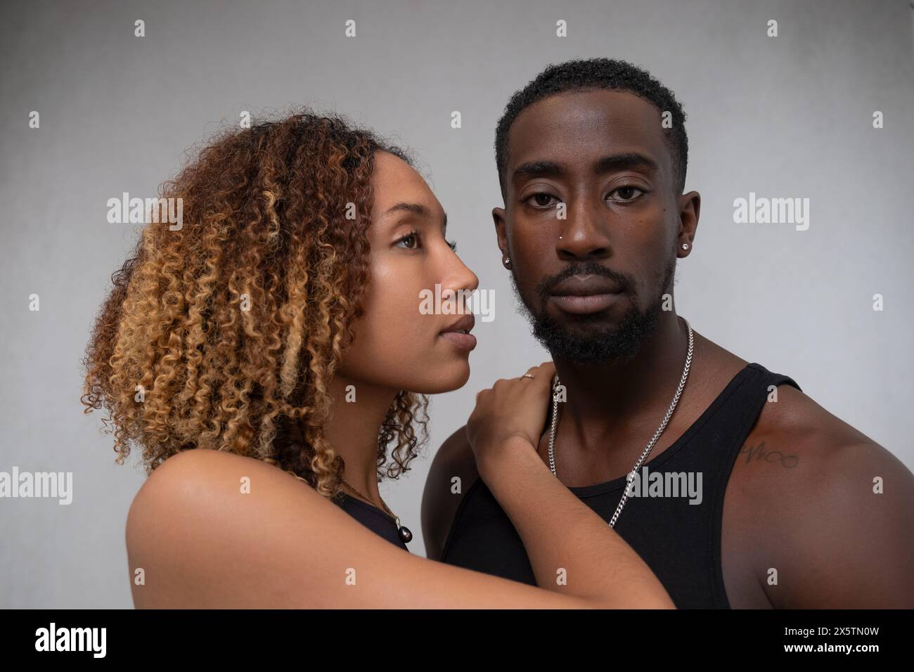 Two men hand on shoulder hi-res stock photography and images - Alamy