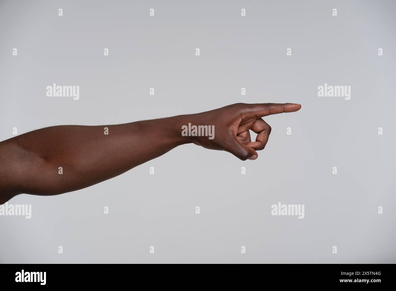 African man hand pointing hi-res stock photography and images - Alamy