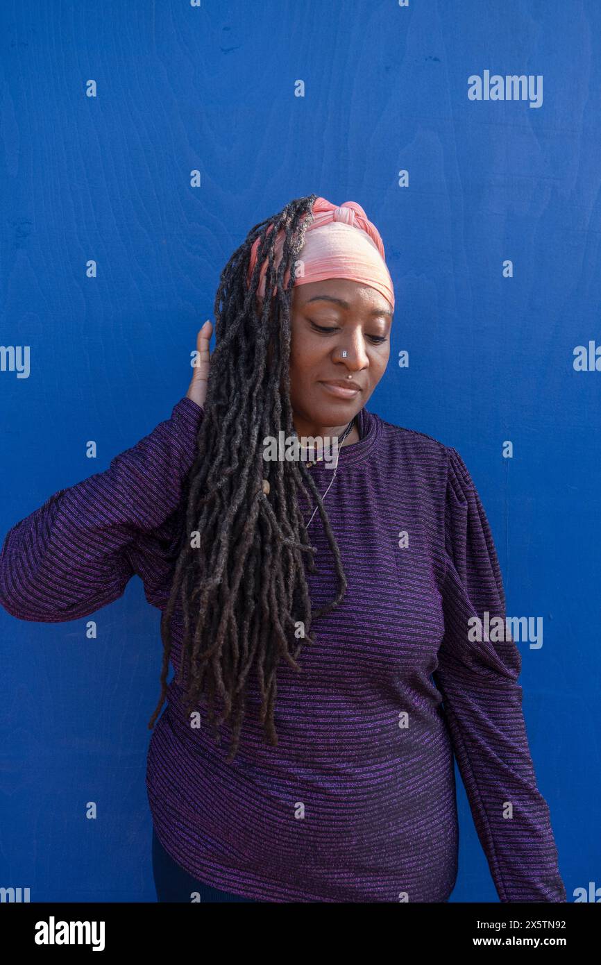 Portrait of beautiful woman with dreadlocks wearing turban Stock Photo ...