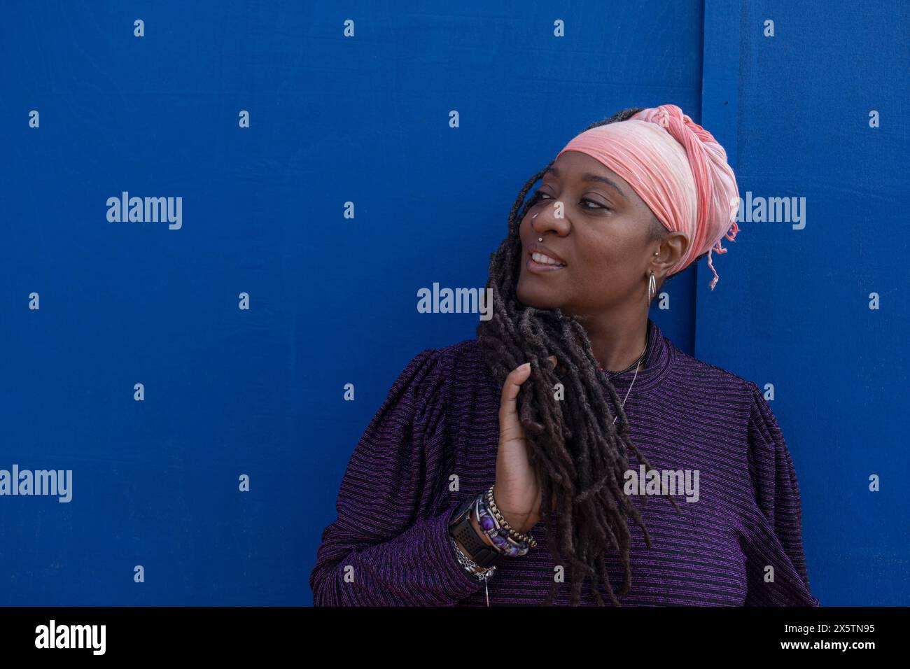 Portrait of beautiful woman with dreadlocks wearing turban Stock Photo ...
