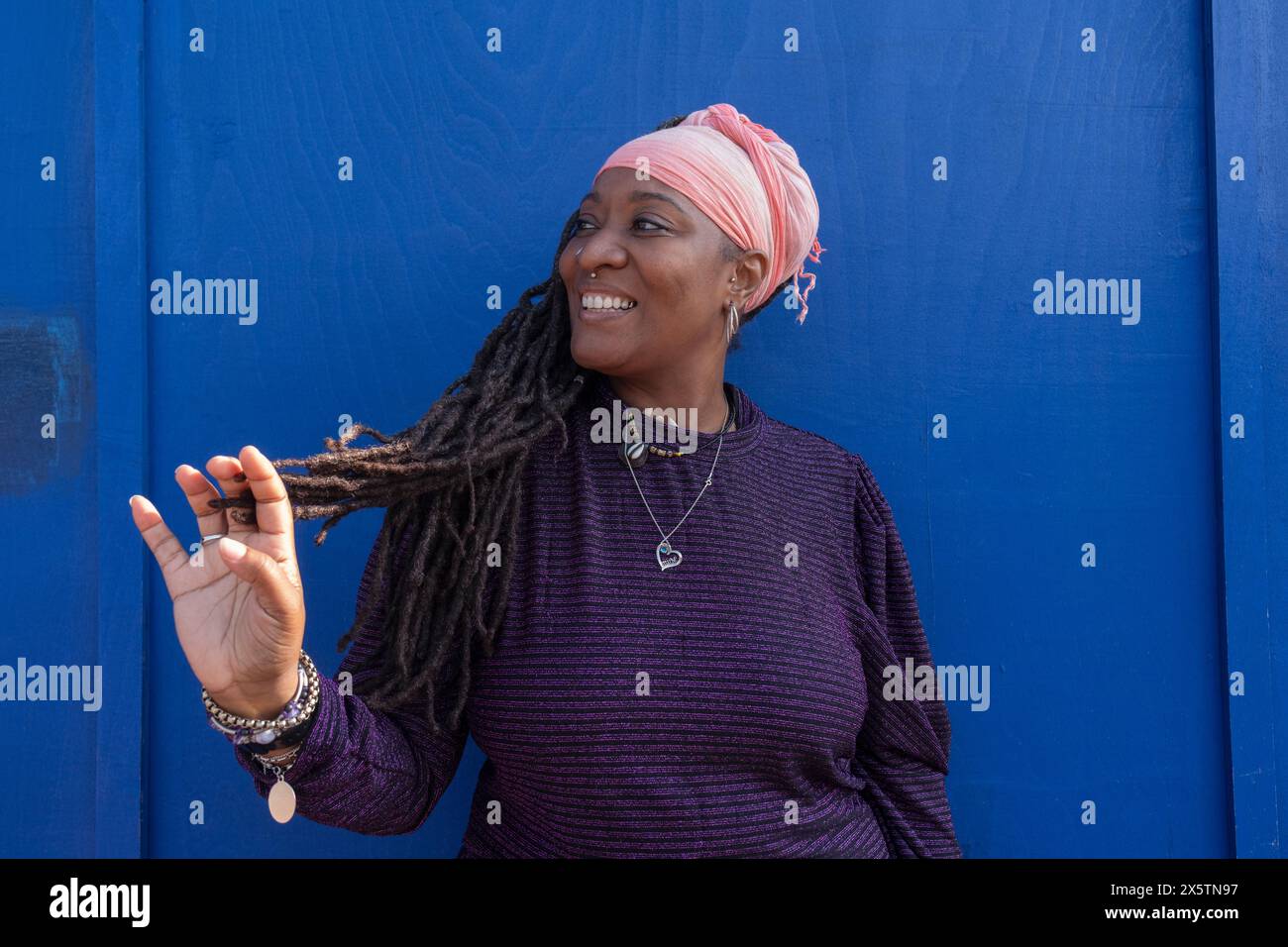 Portrait of beautiful woman with dreadlocks wearing turban Stock Photo ...