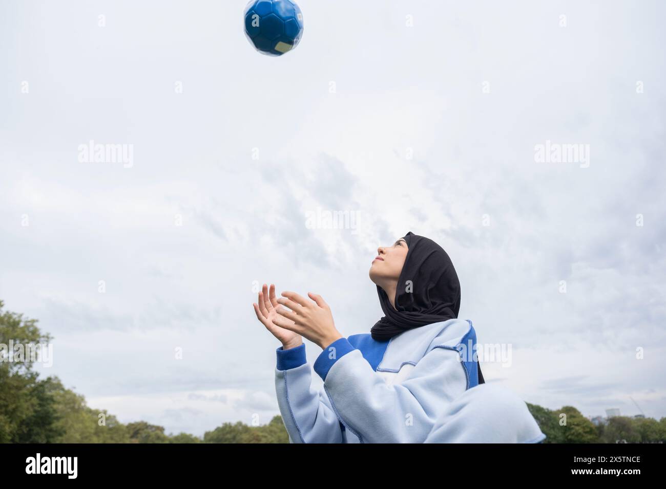 Throwing ball up hi-res stock photography and images - Alamy