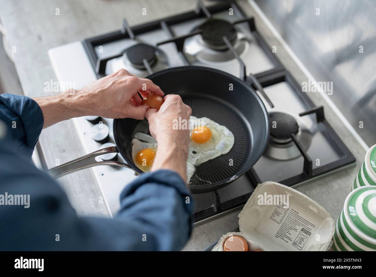 Close up person breaking egg hi-res stock photography and images - Alamy