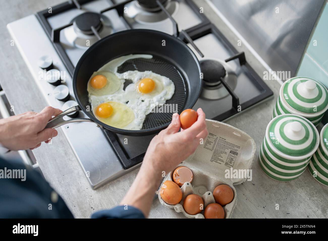 Close up person breaking egg hi-res stock photography and images - Alamy