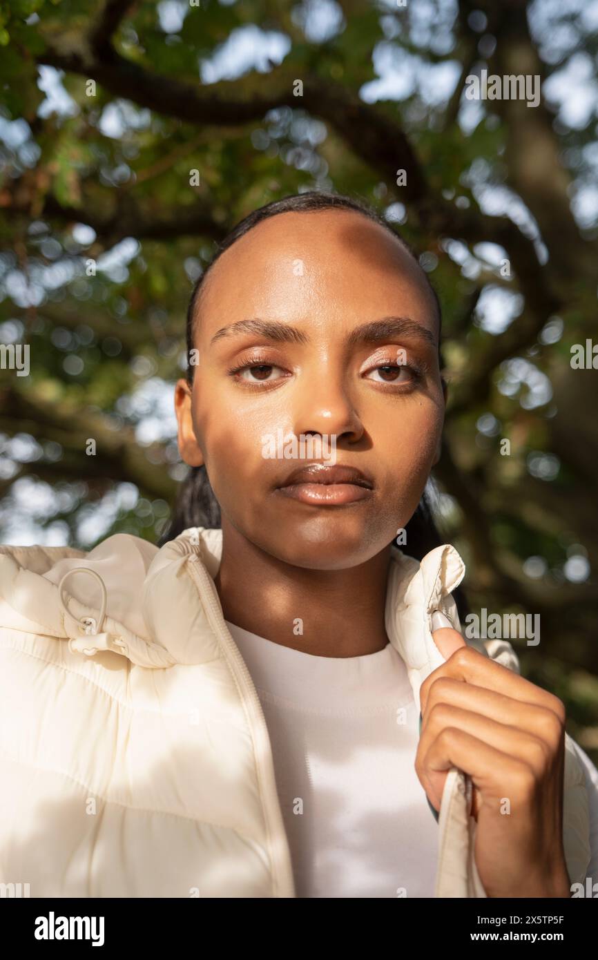 Portrait of woman in sunlight outdoors Stock Photo - Alamy