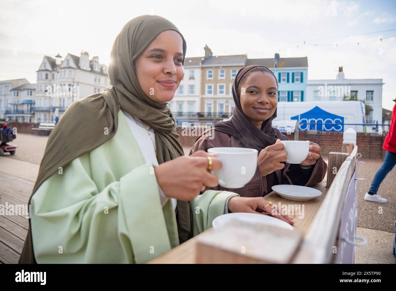 Arab woman drinking coffee in hi-res stock photography and images - Alamy